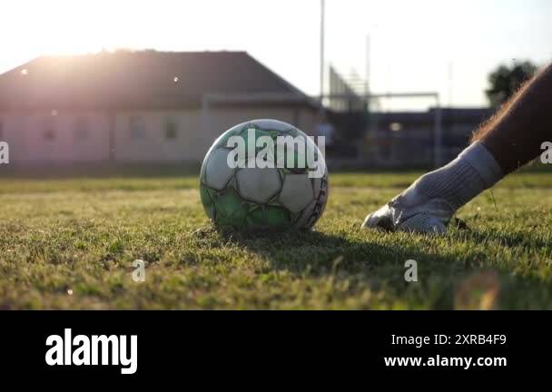 Male foot of professional footballer shooting a penalty kicks on ...