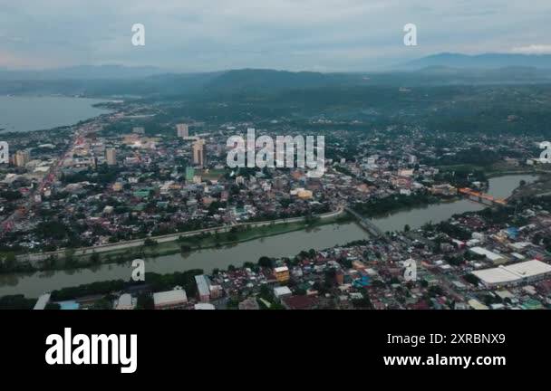 Top view of villages in riverside and highway in Cagayan de Oro ...
