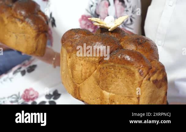 People hold the wedding bread for the consecration ceremony Stock Video ...