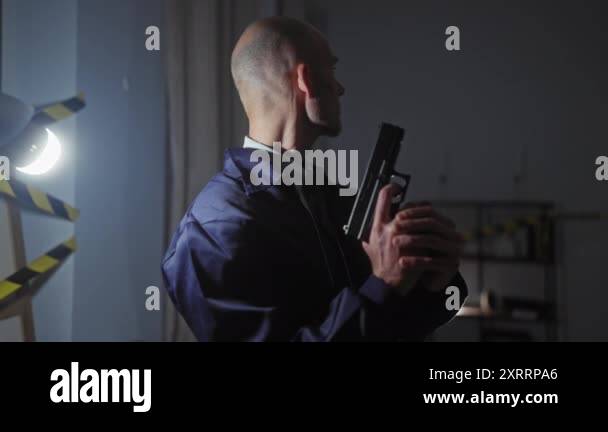 Bald criminal holding gun Stock Videos & Footage - HD and 4K Video ...