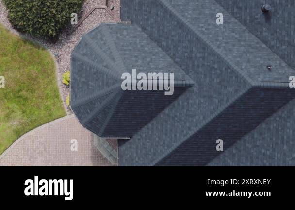 Drone top down view shot of new roof is installed on a private house ...
