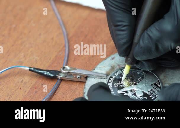 This video shows how to clean a silver coin using the process of ...