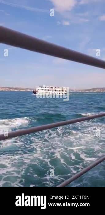 Vertical filming of the Bosphorus Strait from a motor ship, seagulls ...