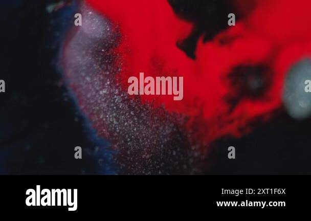 Ink splash. Glitter fluid wave. Blur red blue black color sparkling ...