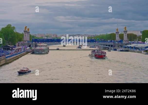 Decorating the Alexander Bridge in Paris with Olympic symbols and the ...
