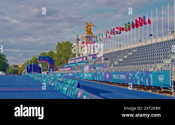 Decorating the Alexander Bridge in Paris with Olympic symbols and the ...