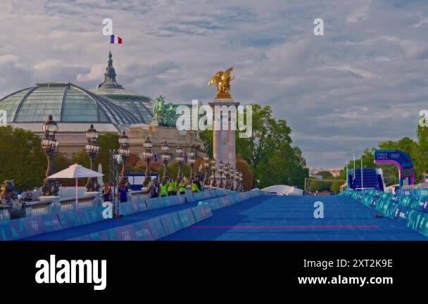 Decorating the Alexander Bridge in Paris with Olympic symbols and the ...