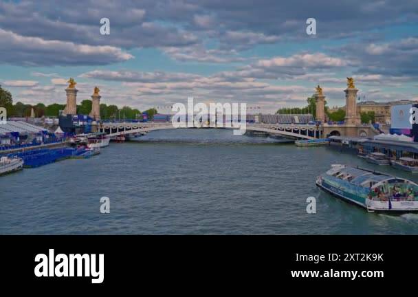 Decorating the Alexander Bridge in Paris with Olympic symbols and the ...