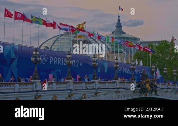 Decorating the Alexander Bridge in Paris with Olympic symbols and the ...