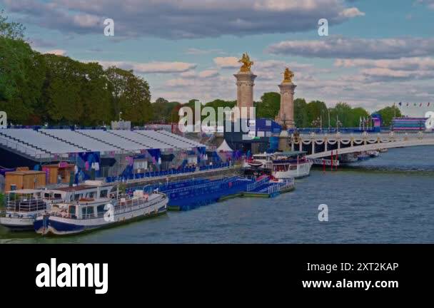 Decorating the Alexander Bridge in Paris with Olympic symbols and the ...