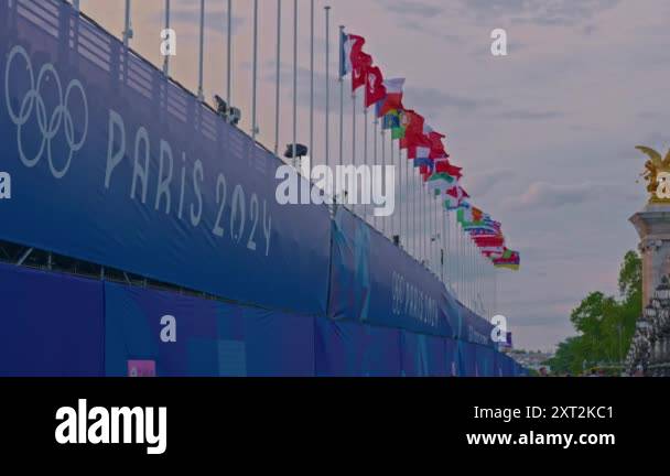 Decorating the Alexander Bridge in Paris with Olympic symbols and the ...