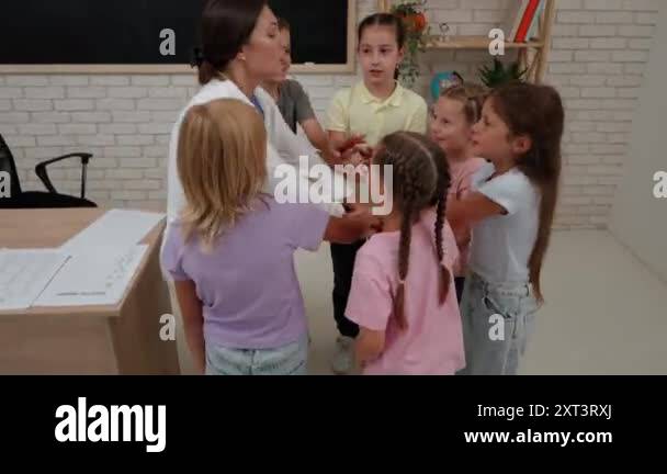 Group of primary school boys and girls. Junior school kids in classroom ...
