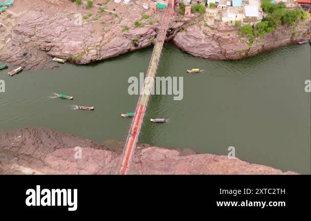 Aerial view of river bridge in small town, Beautiful village with lake ...