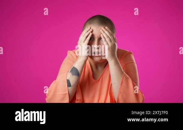 Shocked worried scared pretty gender fluid non binary woman 20s posing ...