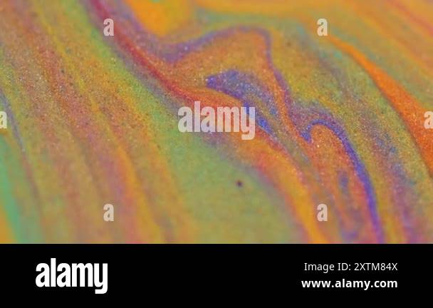 Liquid glitter mix. Marble paint. Blur orange purple green color ...