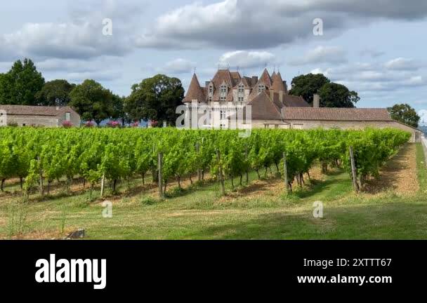 Montbazillac castle in southwestern France, in the Dordogne department ...