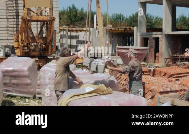 Lift heavy materials Stock Videos & Footage - HD and 4K Video Clips - Alamy