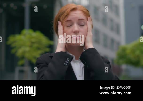 Close up unhappy tired young Caucasian ginger woman gen z businesswoman ...