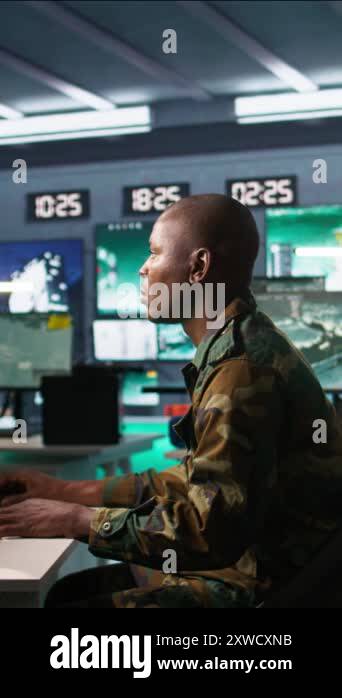 Vertical video Intelligence operative in military base doing ...
