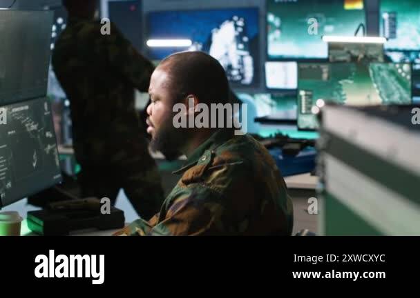 Soldier doing tasks in military base, using radar, intercepting and destroying ballistic rockets ...