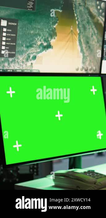 Vertical video Military agent working in control room, using software ...