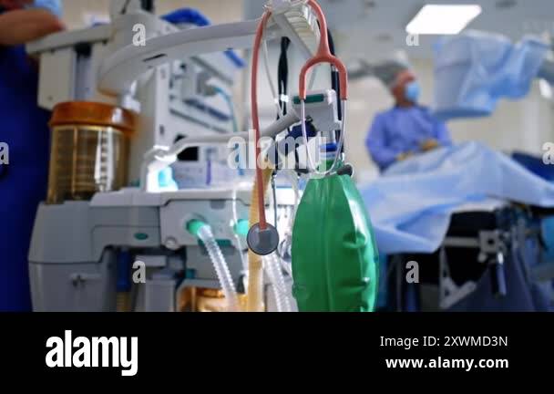 Doctor's tools hanging on the apparatus. Stethoscope and ambu bag are ...