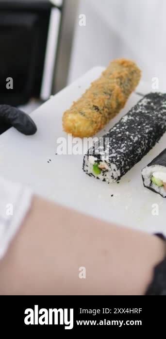 Cooking process, Step by step, Sushi tempura Hands in black gloves dip ...