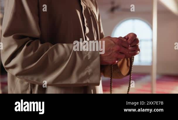 Muslim, hands and person with prayer beads for religion, worship and ...