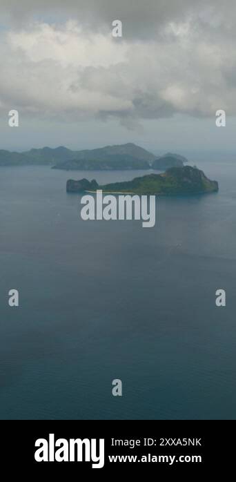 White sand beach in Helicopter Island and in Cadlao Island. El Nido ...
