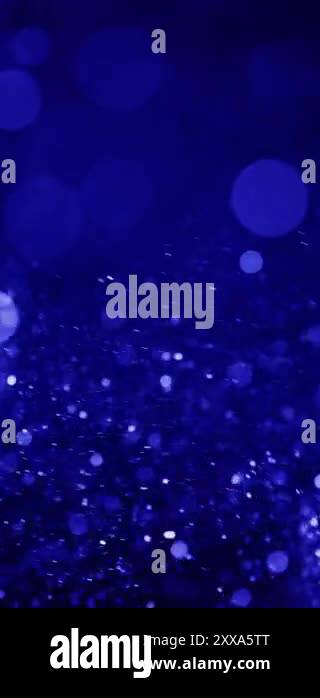 A variety of circular particles float against a gradient blue ...