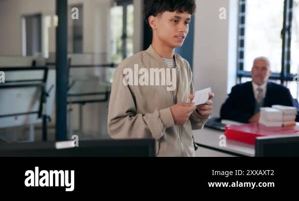 Cards, education and speech with teen boy in class of university for ...