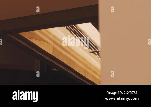 A close-up view of a modern architectural detail featuring a slanted ...