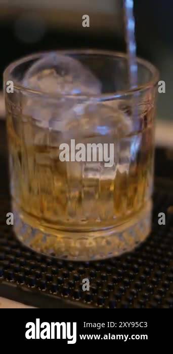 This video showcases closeups of whiskey in a bar, highlighting its ...