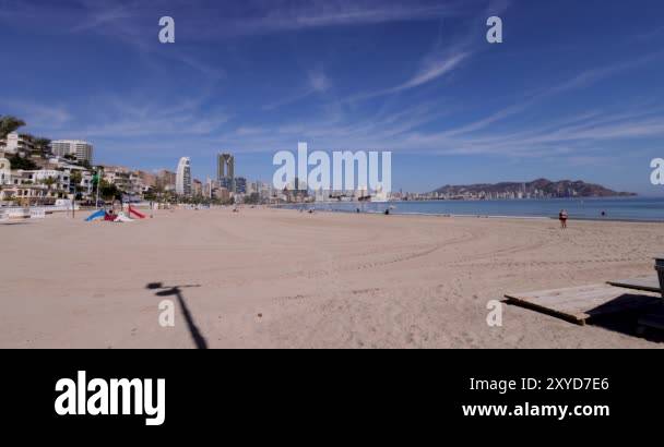 Footage of the town of Benidorm in Spain in the summer time showing ...