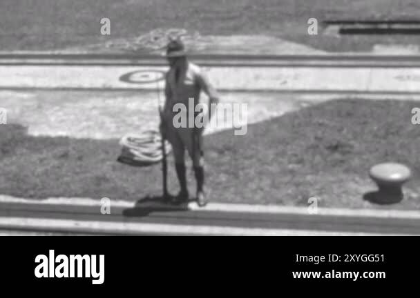 Armed soldier standing and monitoring ships crossing the Panama Canal ...
