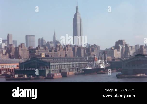 Empire State Building towering among Manhattan skyscrapers, viewed from ...