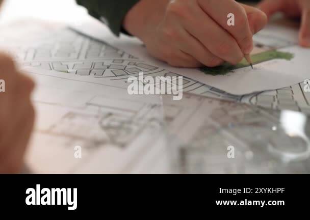 A video of architect with triangle ruler and pencil to measure ...