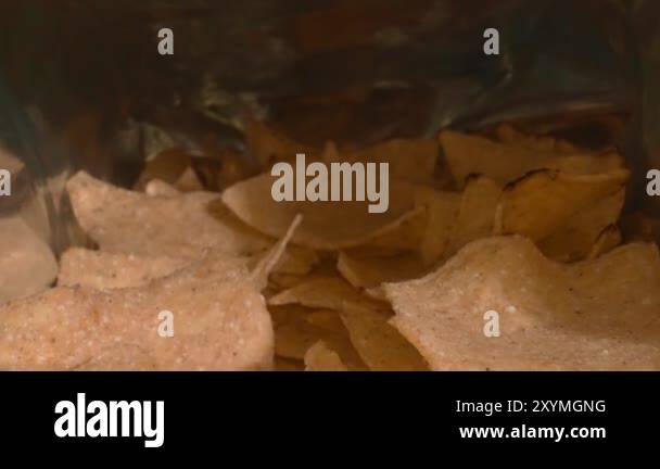 Close up of snacks scattered and contained in a package. Macro of snack ...