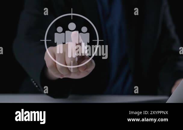 Business person analyzes data to identify customer target groups ...