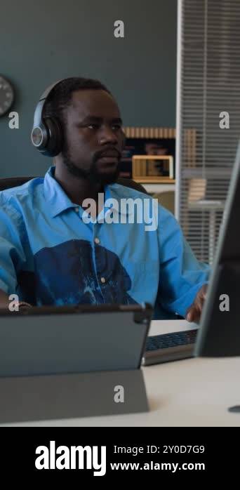 Programmer wearing headphones using Stock Videos & Footage - HD and 4K ...