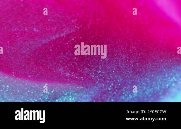 Glitter fluid splash. Ink spill. Blur neon magenta pink blue color ...
