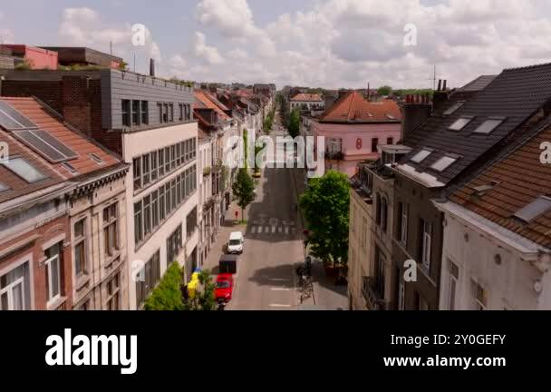 Calm street in a residential street in a European Capital, with cars ...