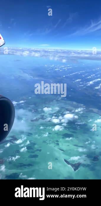 Air Canada flight, capturing the wing, engine, and cloud movement from ...