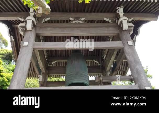 Tokyo, Japan-12 May 2024: Traditional ancient Japanese bronze Bonsho Bell at Zojoji temple ...