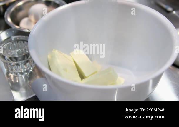Preparing dough for food dessert in professional kitchen. Drop white ...
