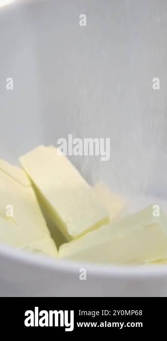 Preparing dough for food dessert in professional kitchen. Drop white ...