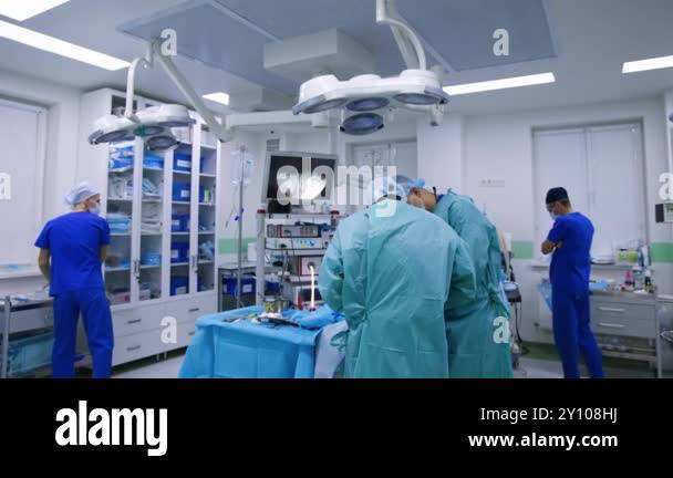 Surgical procedure conducted in the modern operational room. Nurses ...