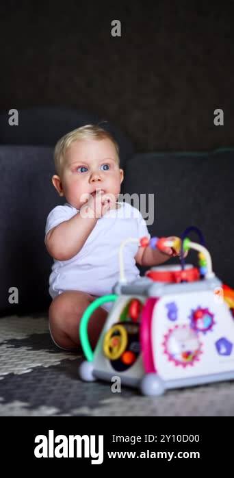 Baby holding small toy block Stock Videos & Footage - HD and 4K Video ...