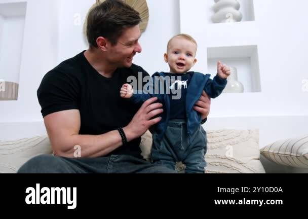 Boy smiling beside father Stock Videos & Footage - HD and 4K Video ...