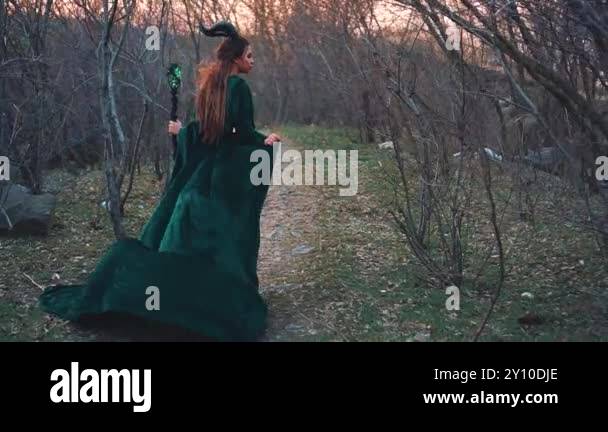 ancient spirit of forest, lady in a long emerald velor dress with long ...